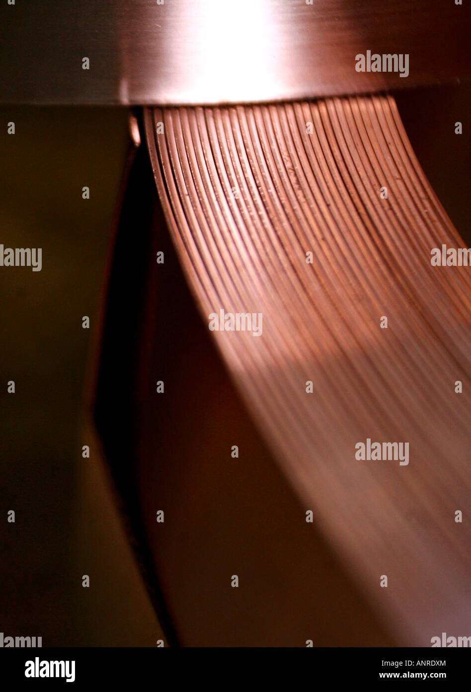 Copper Stripping Coil in a copper distribution centre Stock Photo - Alamy