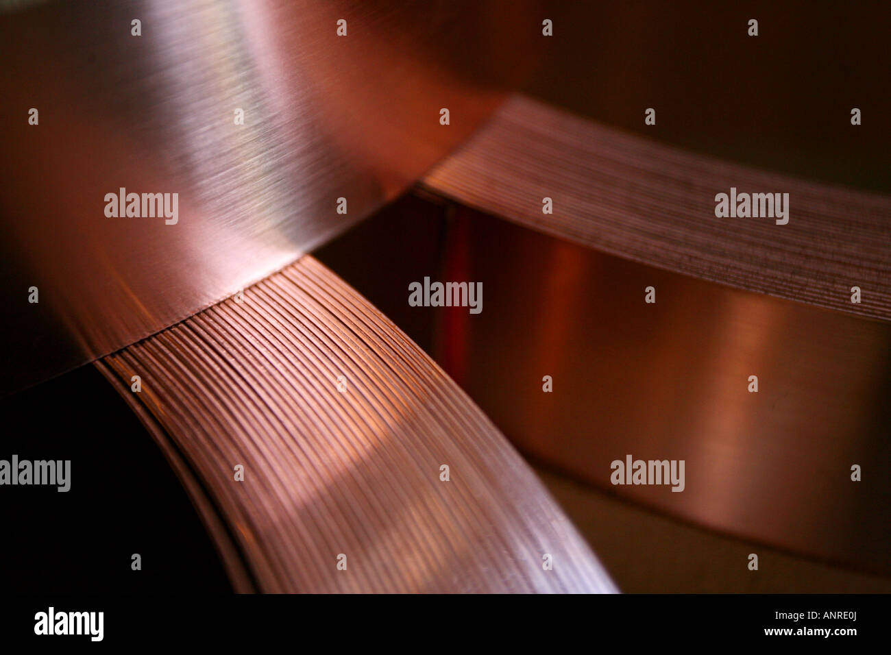 Copper Stripping Coil in a copper distribution centre Stock Photo - Alamy