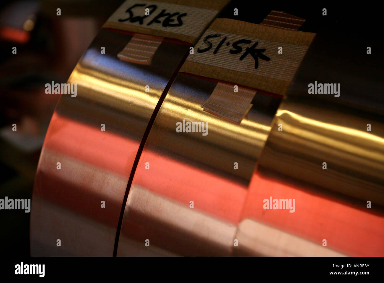 Copper Stripping Coil in a copper distribution centre Stock Photo - Alamy