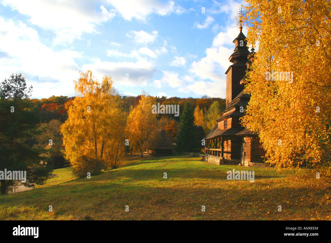 Ancient rural church in the autumn landscape Stock Photo - Alamy