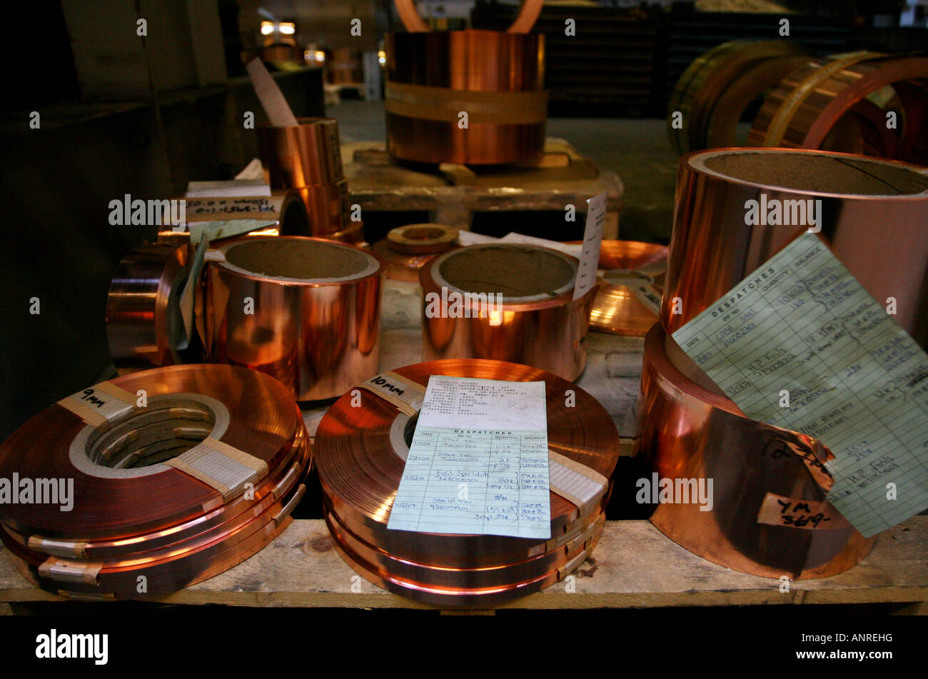 Copper Stripping Coil in a copper distribution centre Stock Photo - Alamy