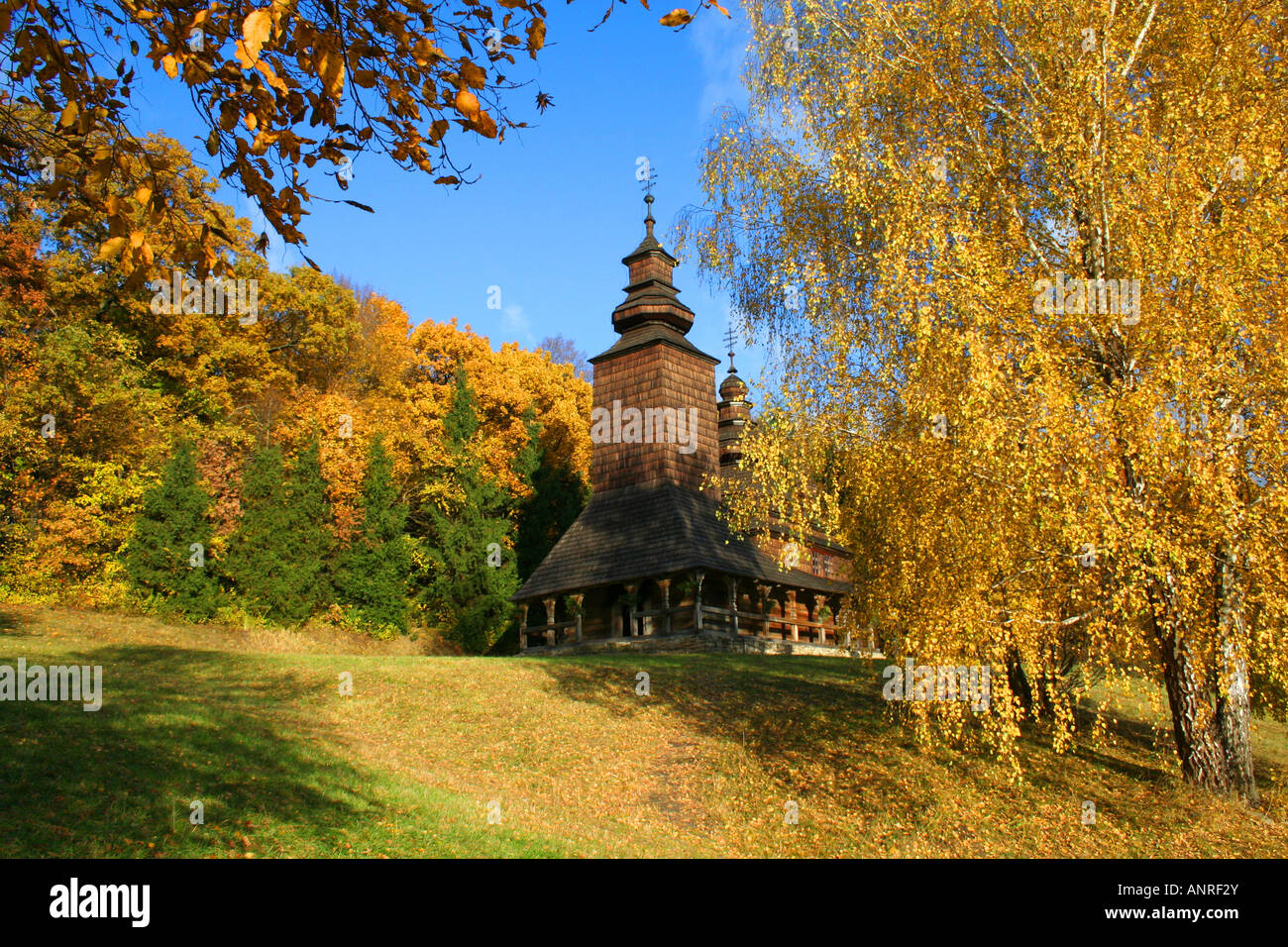 Ancient rural church in the autumn landscape Stock Photo - Alamy