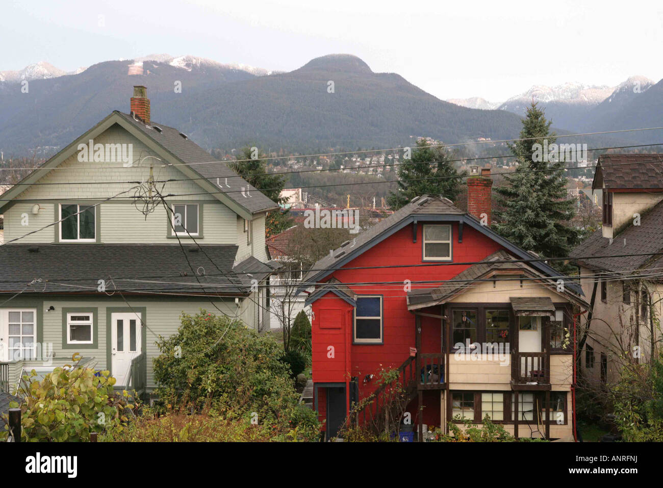 View over traditional suburban houses toward mountains, Vancouver ...