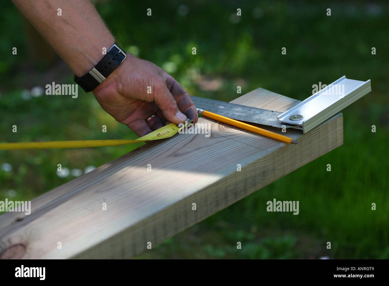 Measure carpenter, joiner Stock Photo - Alamy