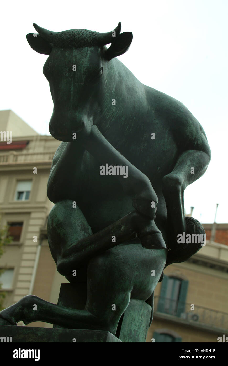 a bull imitating rodin thinker Stock Photo - Alamy