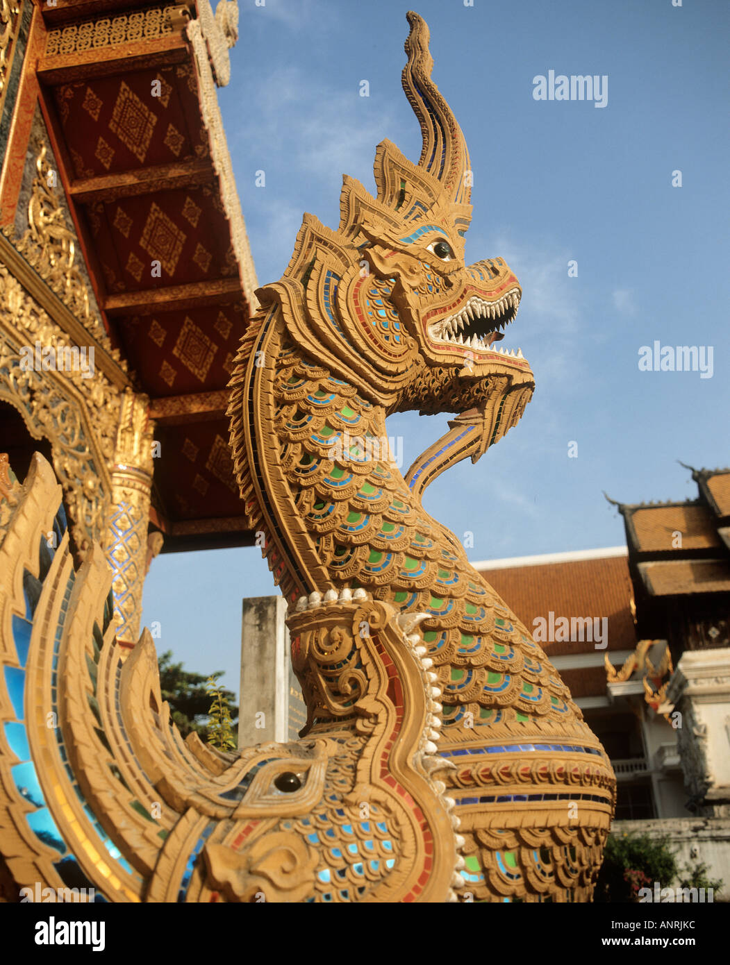 The detailed carvings of a naga or dragon headed serpent are visible on ...