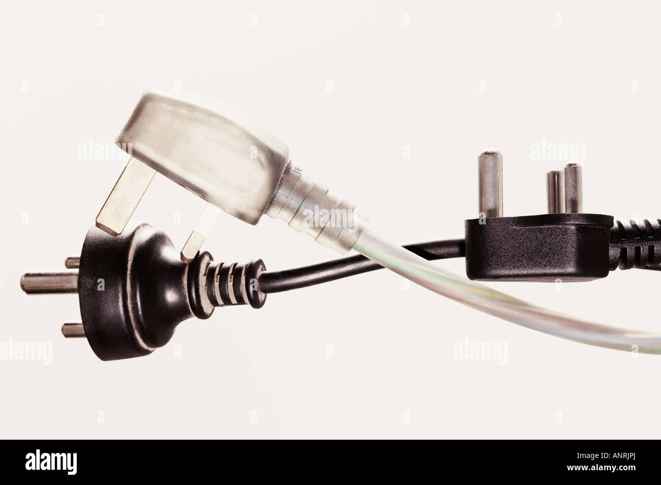 Close-up of three electrical plugs Stock Photo - Alamy