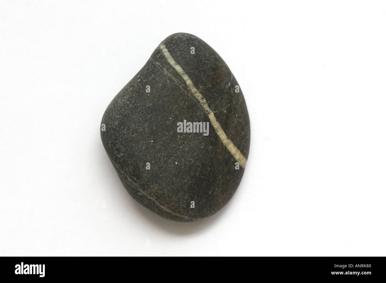 GREY STONE QUARTZ WHITE LINE RUNNING THROUGH IT ON WHITE BACKGROUND ...