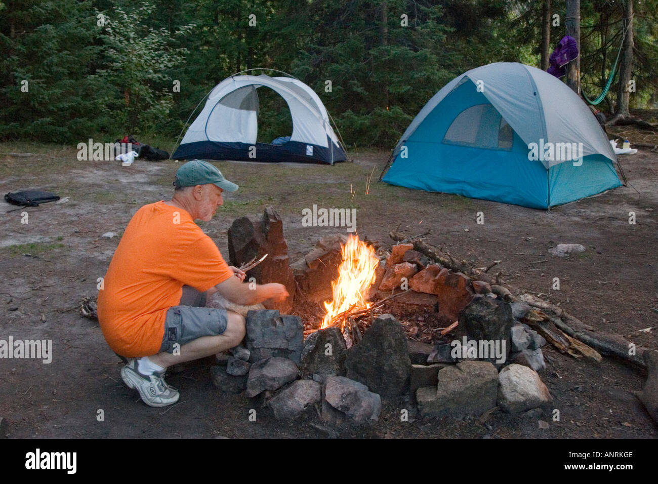 Quetico Provincial Park Ontario Tony Rothschild makes a campfire while ...