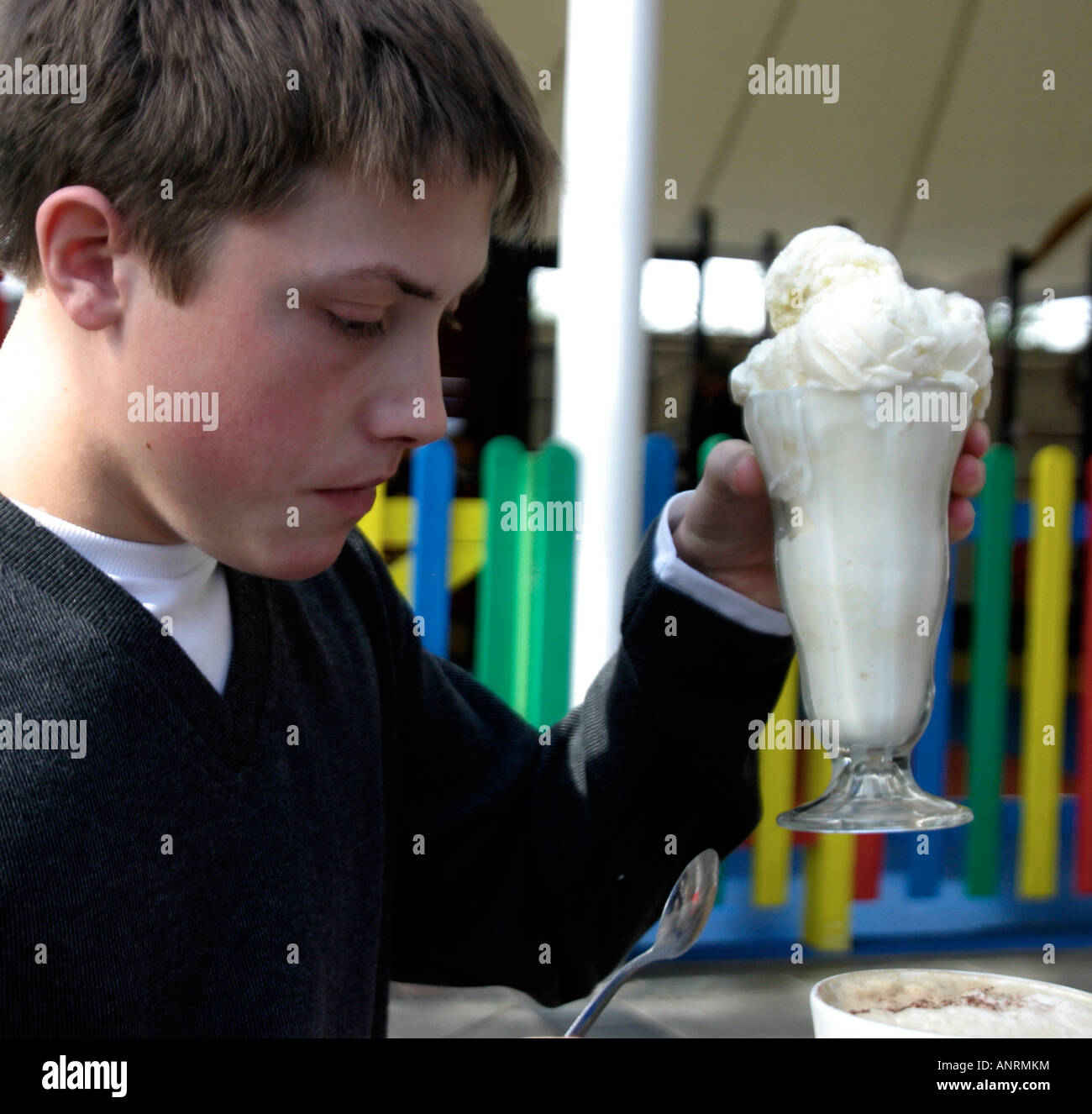 a seventeen year old youth with profound autism, and a large glass of ...