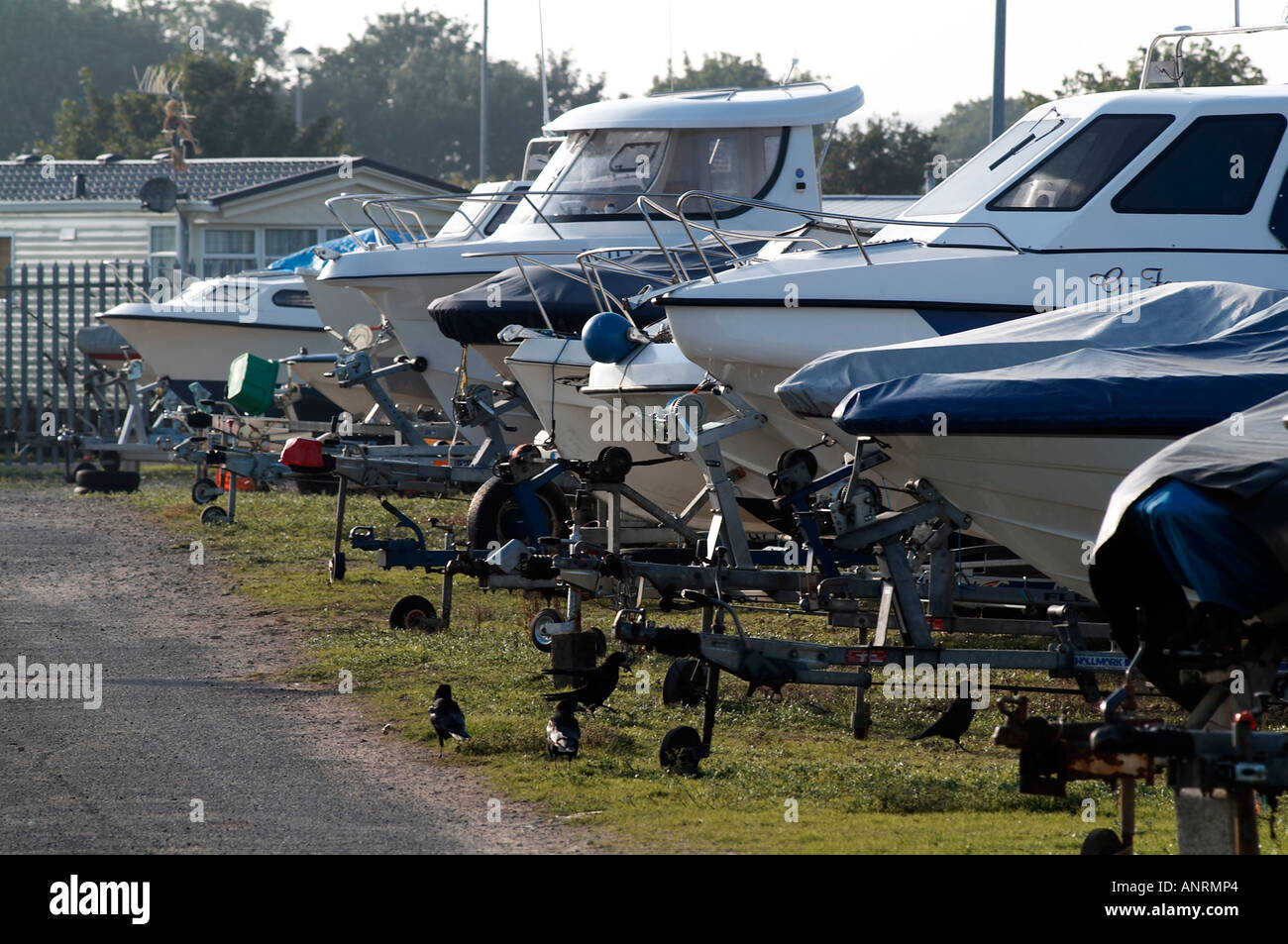 small, boats, on. towing, trailers, parked, near, seafront, towing ...