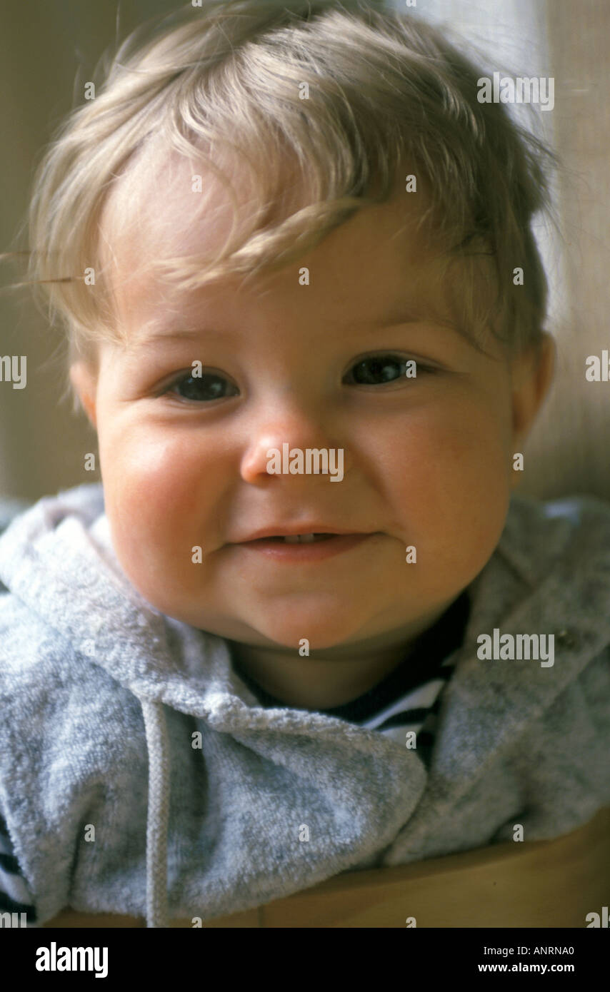 Baby cheeky expression hi-res stock photography and images - Alamy