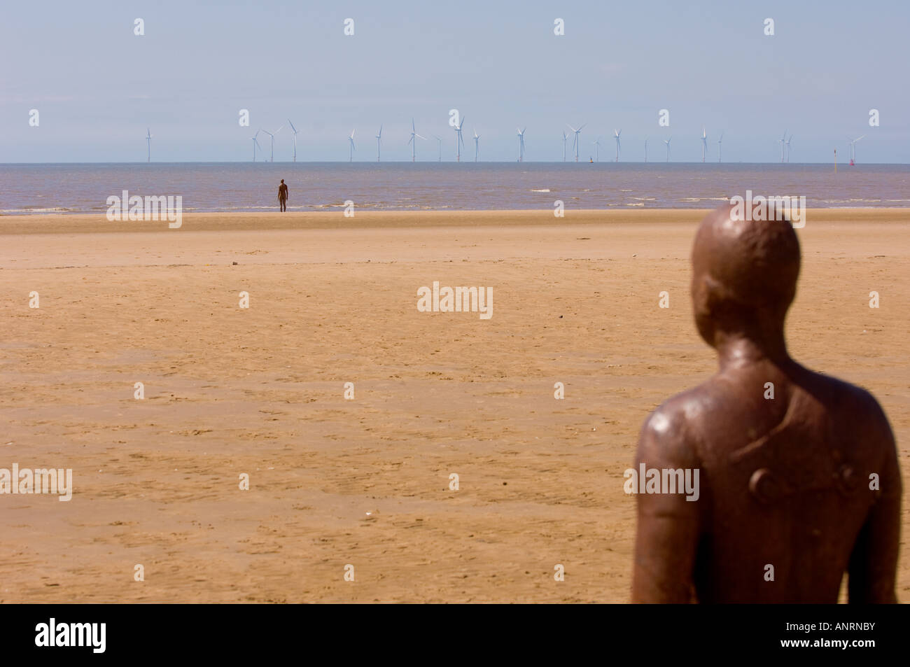 Another Place by Antony Gormley Iron man statue on Crosby Beach with ...
