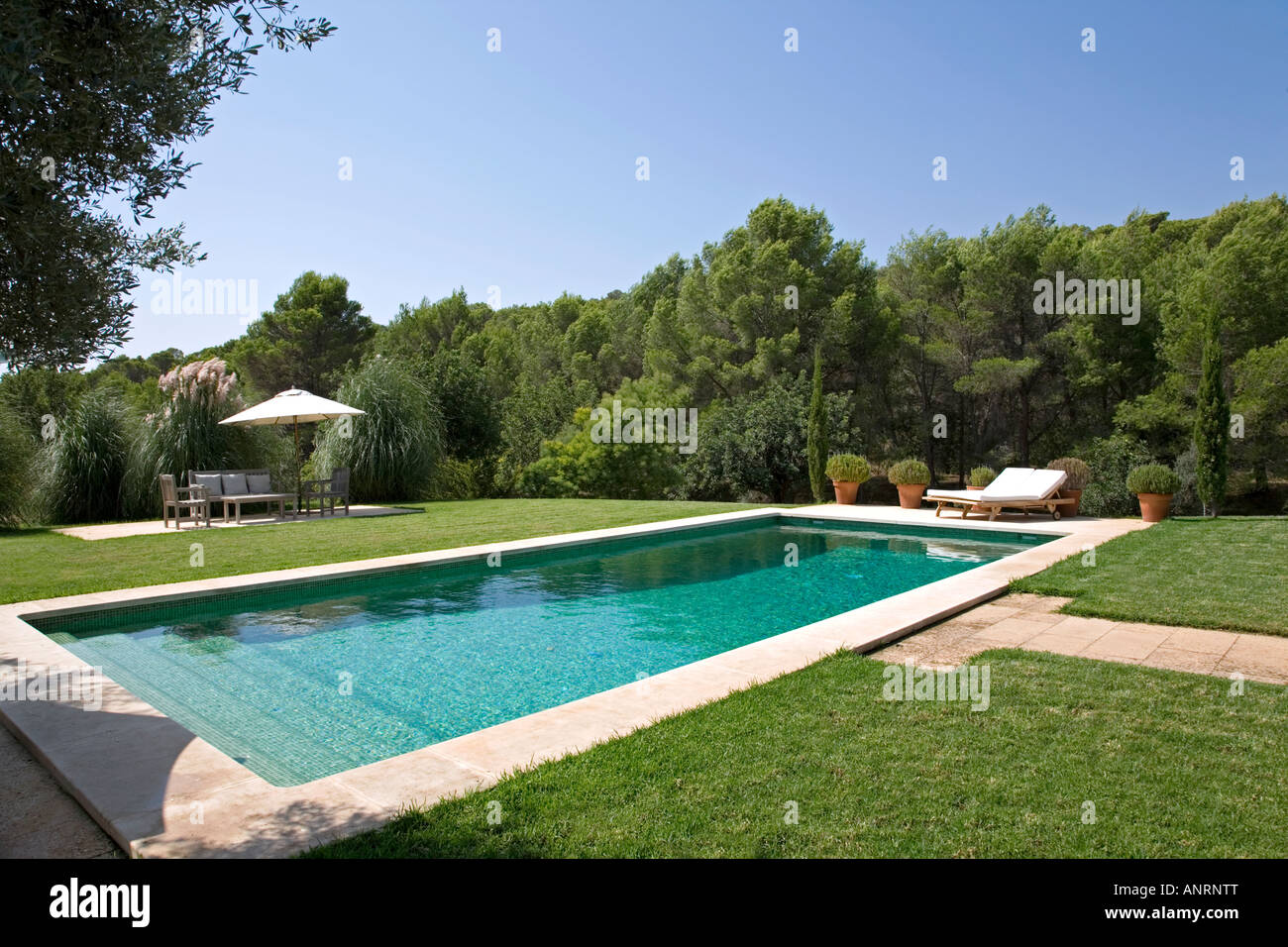 Swimming pool and garden. Bunyola. Mallorca. Spain Stock Photo - Alamy