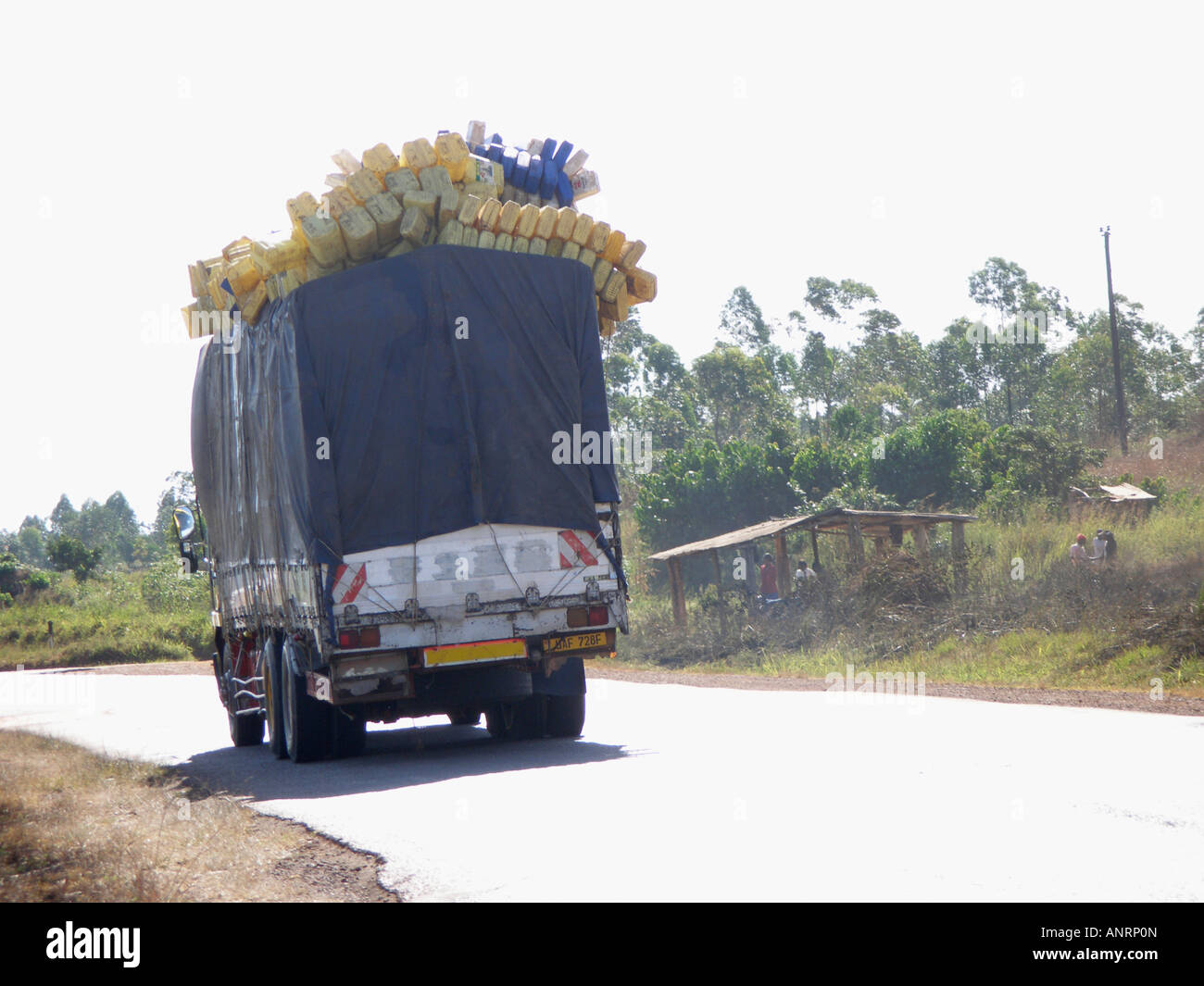 Overloaded lorry on Masaka Road, Uganda Stock Photo - Alamy