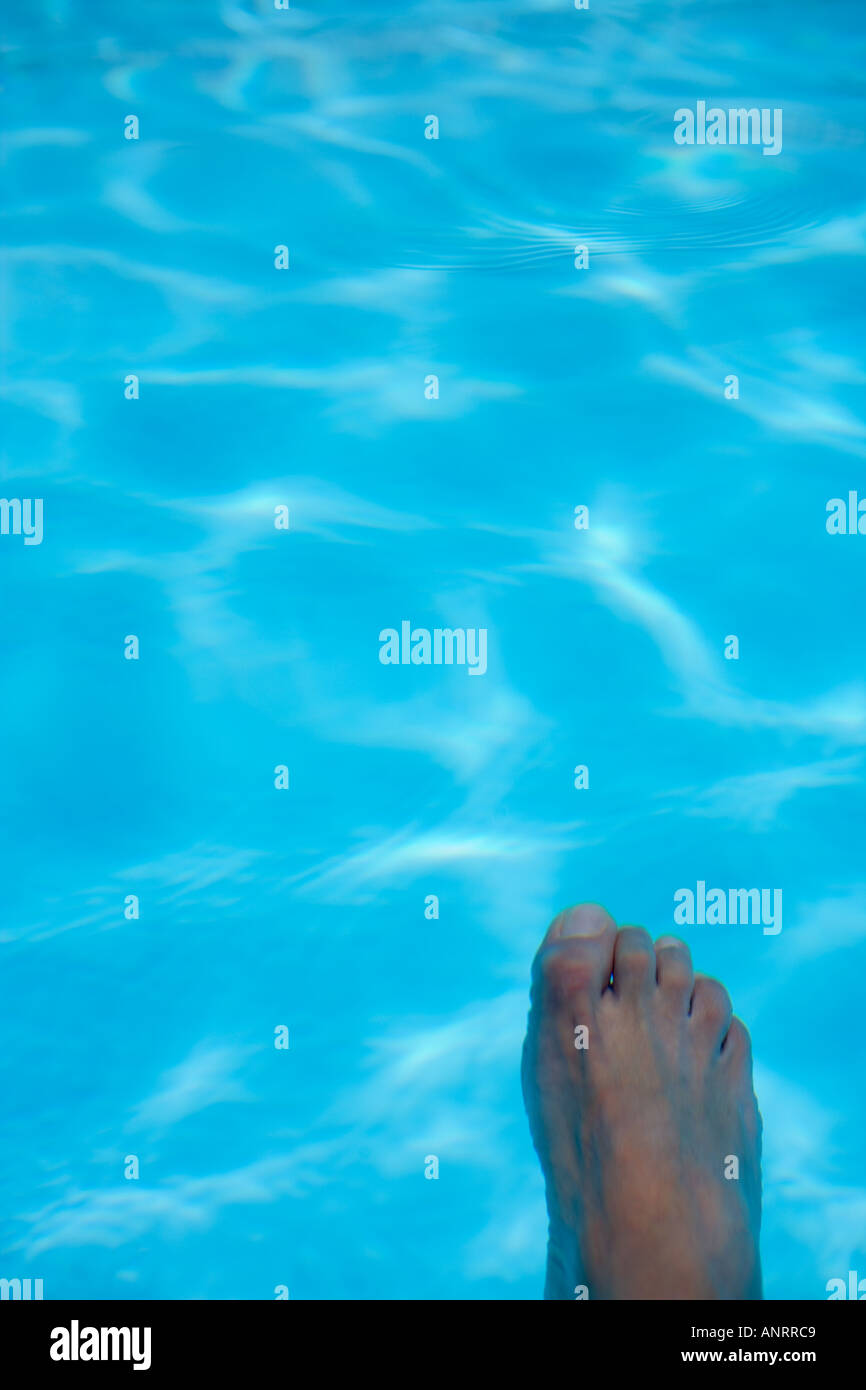 Dipping foot in water hi-res stock photography and images - Alamy
