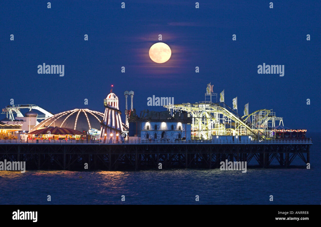 BRIGHTON PIER AND HARVEST MOON Sussex UK Stock Photo - Alamy