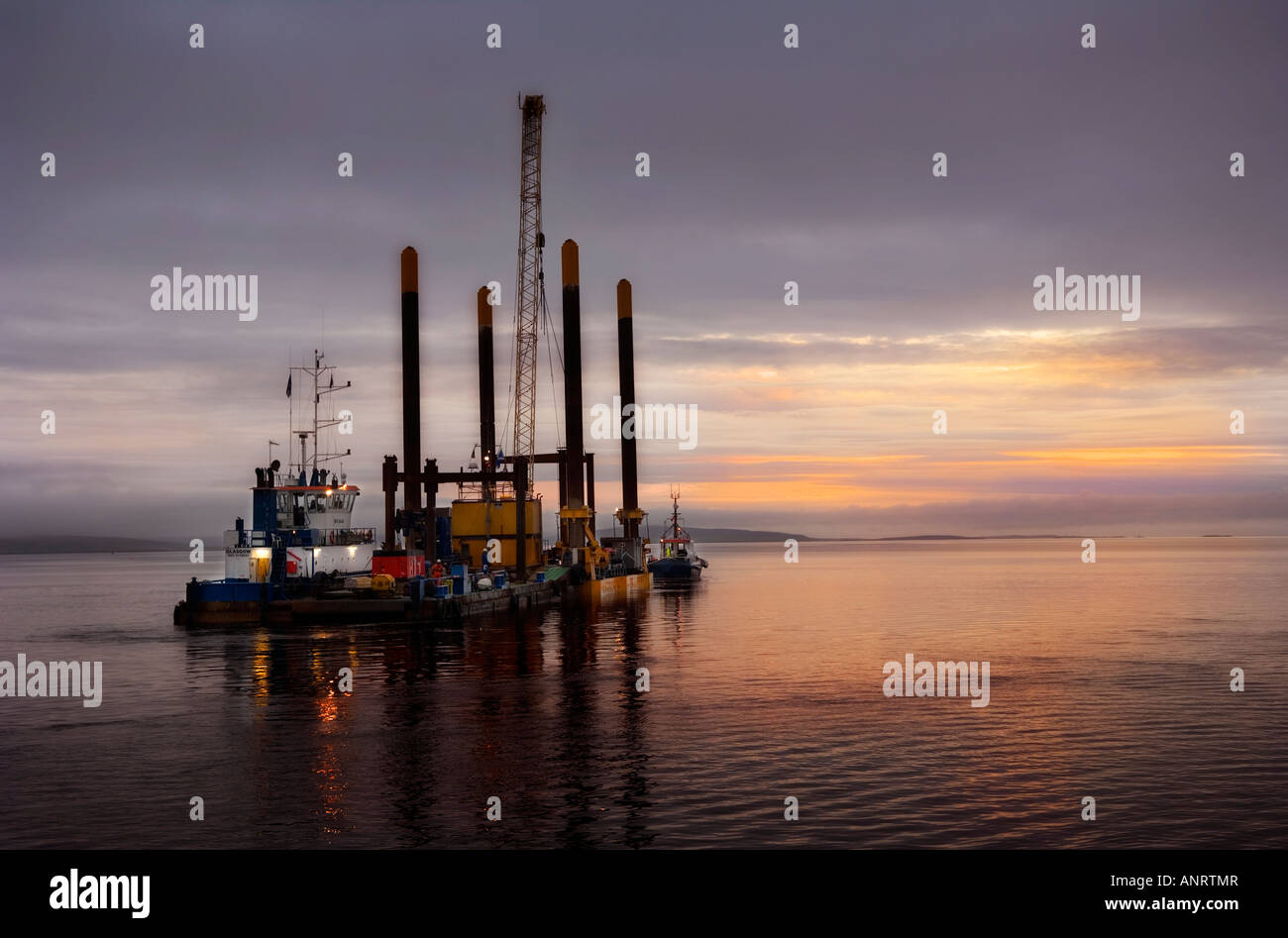 Floating work platform / barge with crane Stock Photo - Alamy