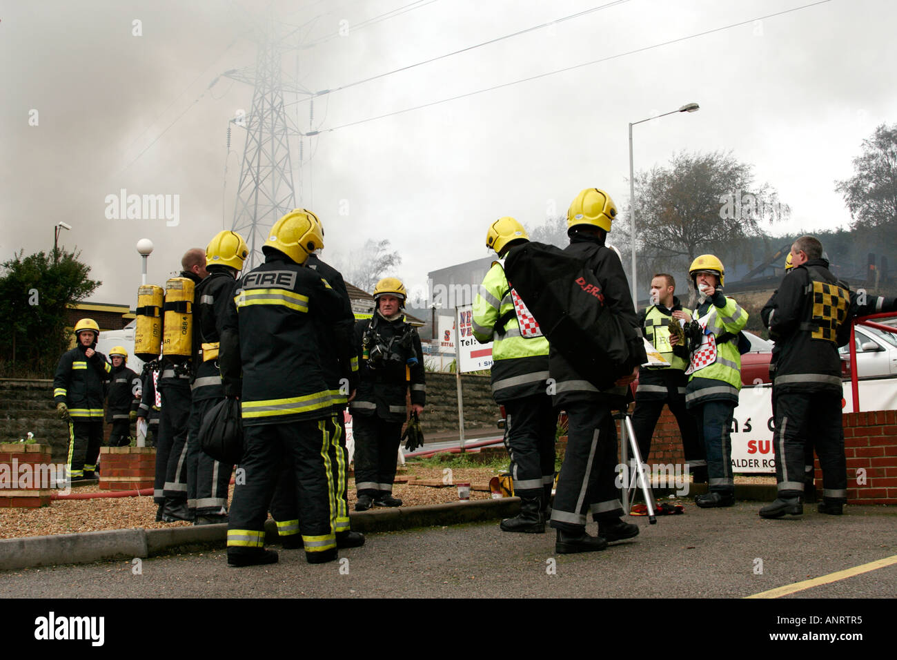 Firemen on duty Stock Photo - Alamy