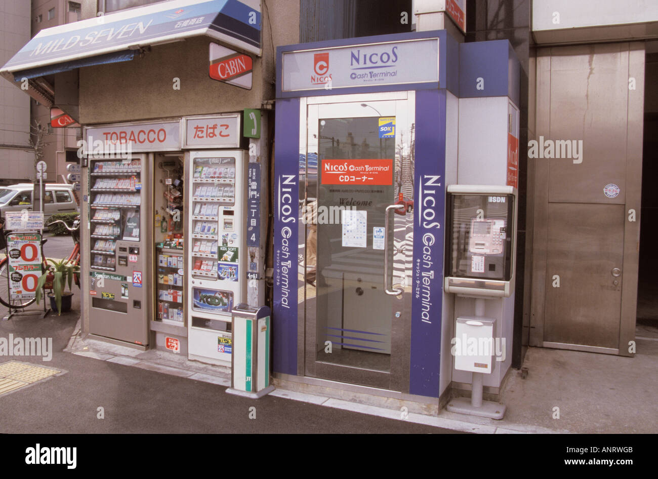 Asakusa Japan Tokyo ATM cash machine booth next to a tobacconists shop ...