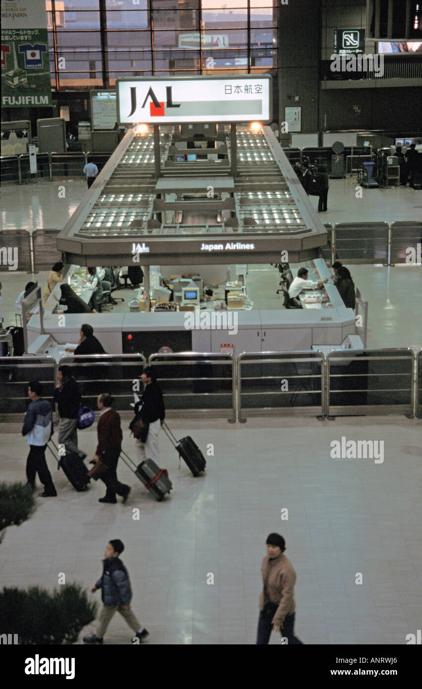 Tokyo airport check in desks hi-res stock photography and images - Alamy