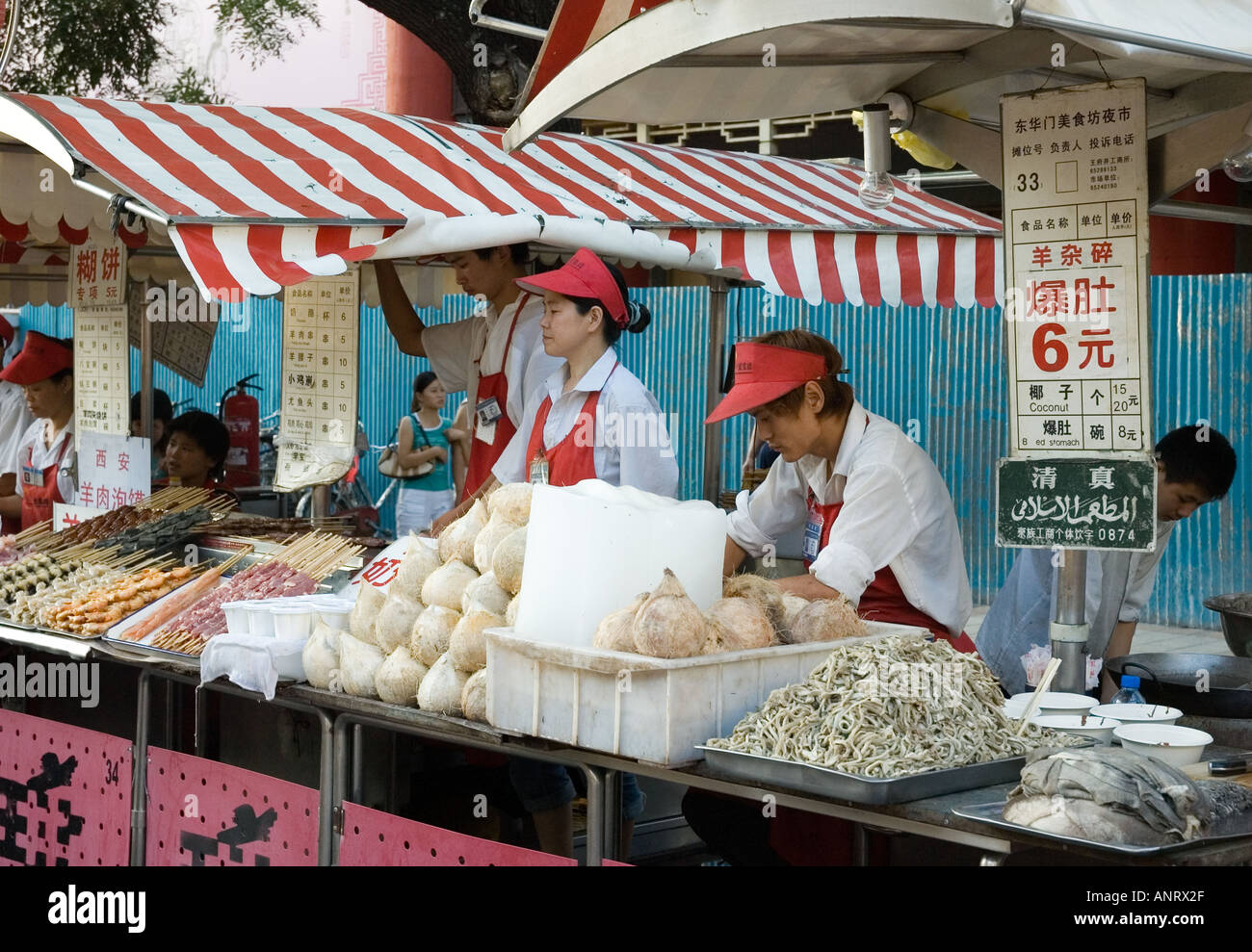 Stall selling fish and meat at food market, Beijing, China Stock Photo ...