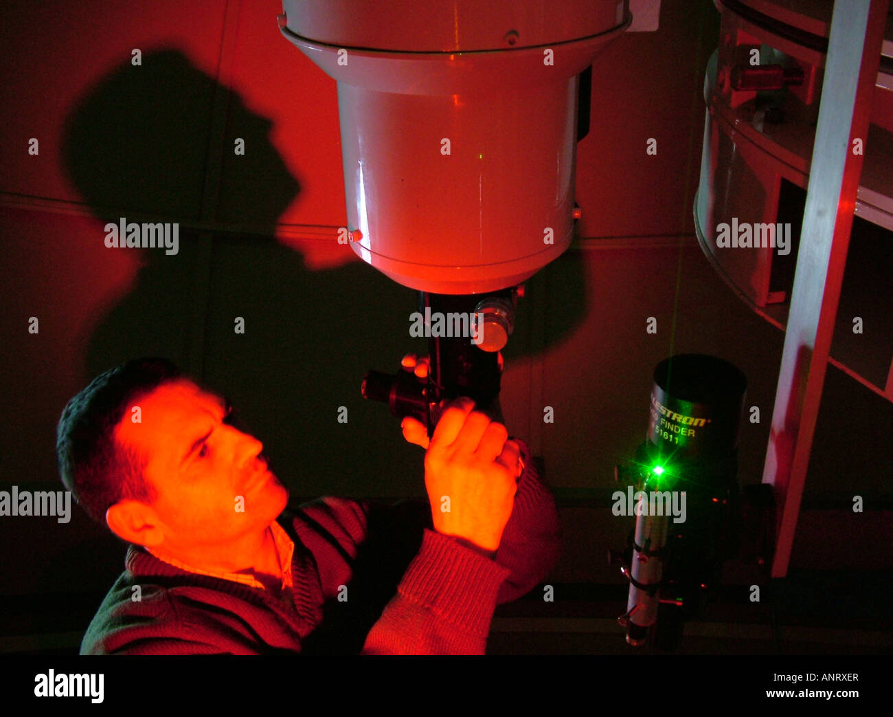 Astronomer in observatory Stock Photo - Alamy
