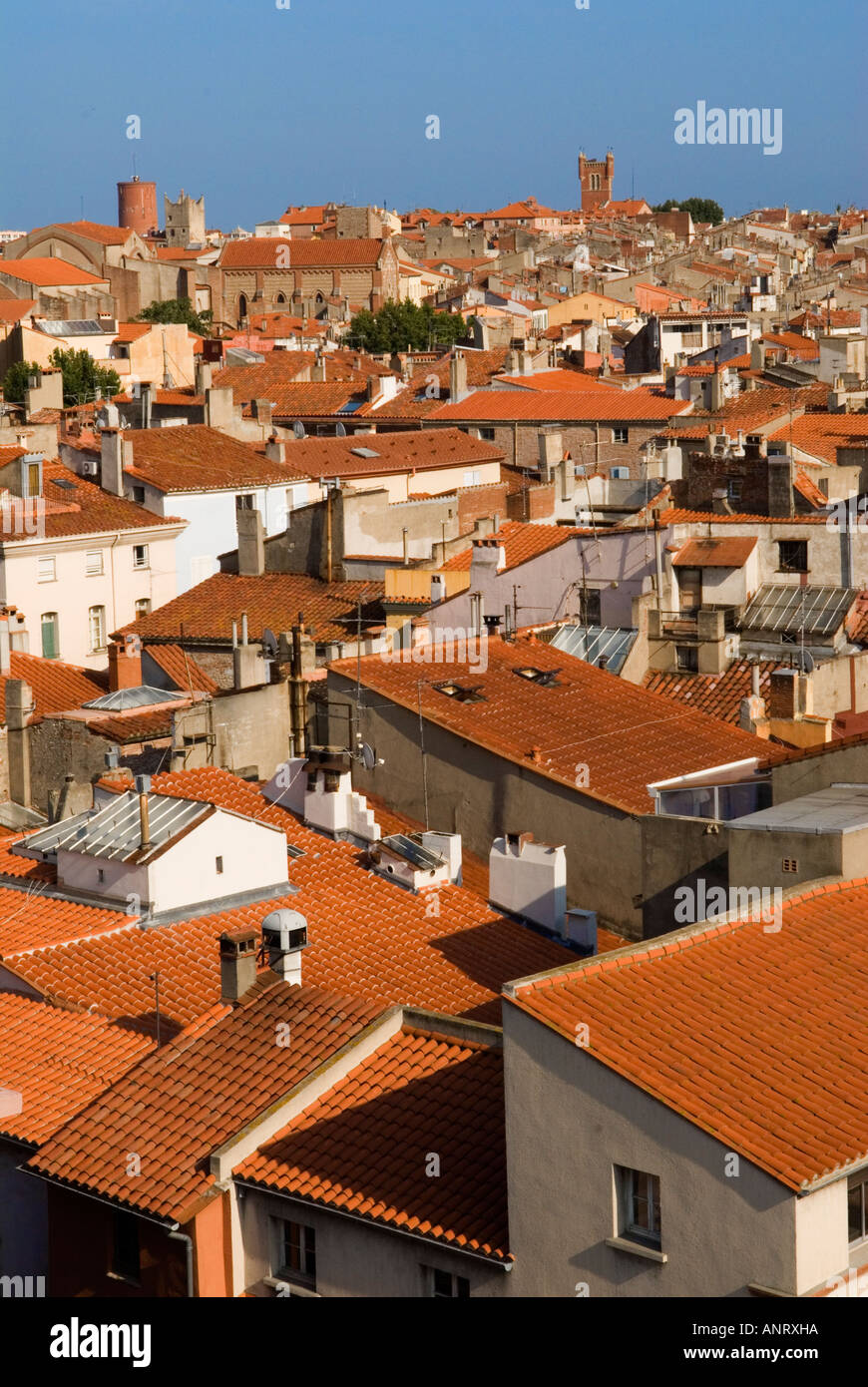 Roof tops skyline across the medieval city town of Perpignan France ...