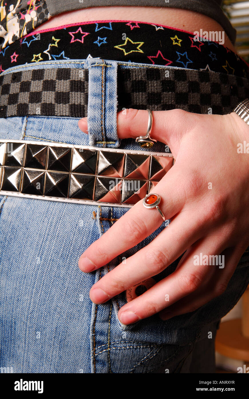 Teenage Girl With Hand on Waist Stock Photo - Alamy