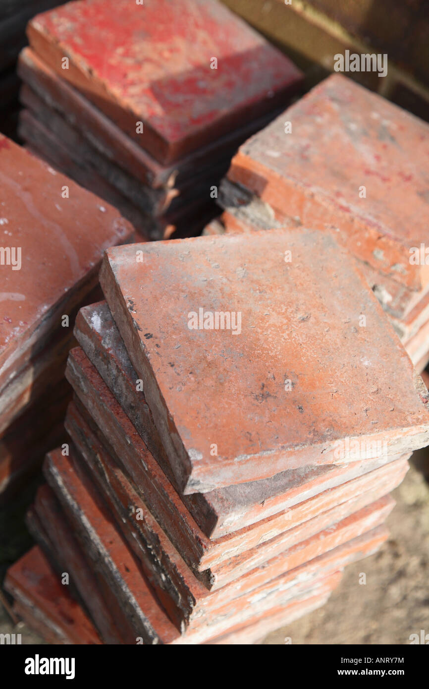 Stacks of red quarry tiles Stock Photo - Alamy