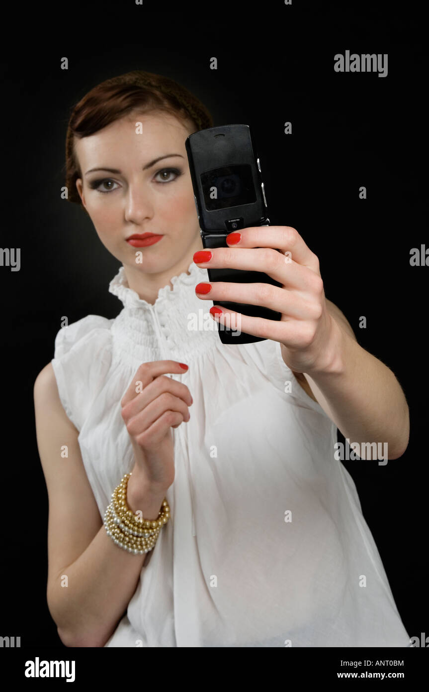 1920s woman camera taking hi-res stock photography and images - Alamy