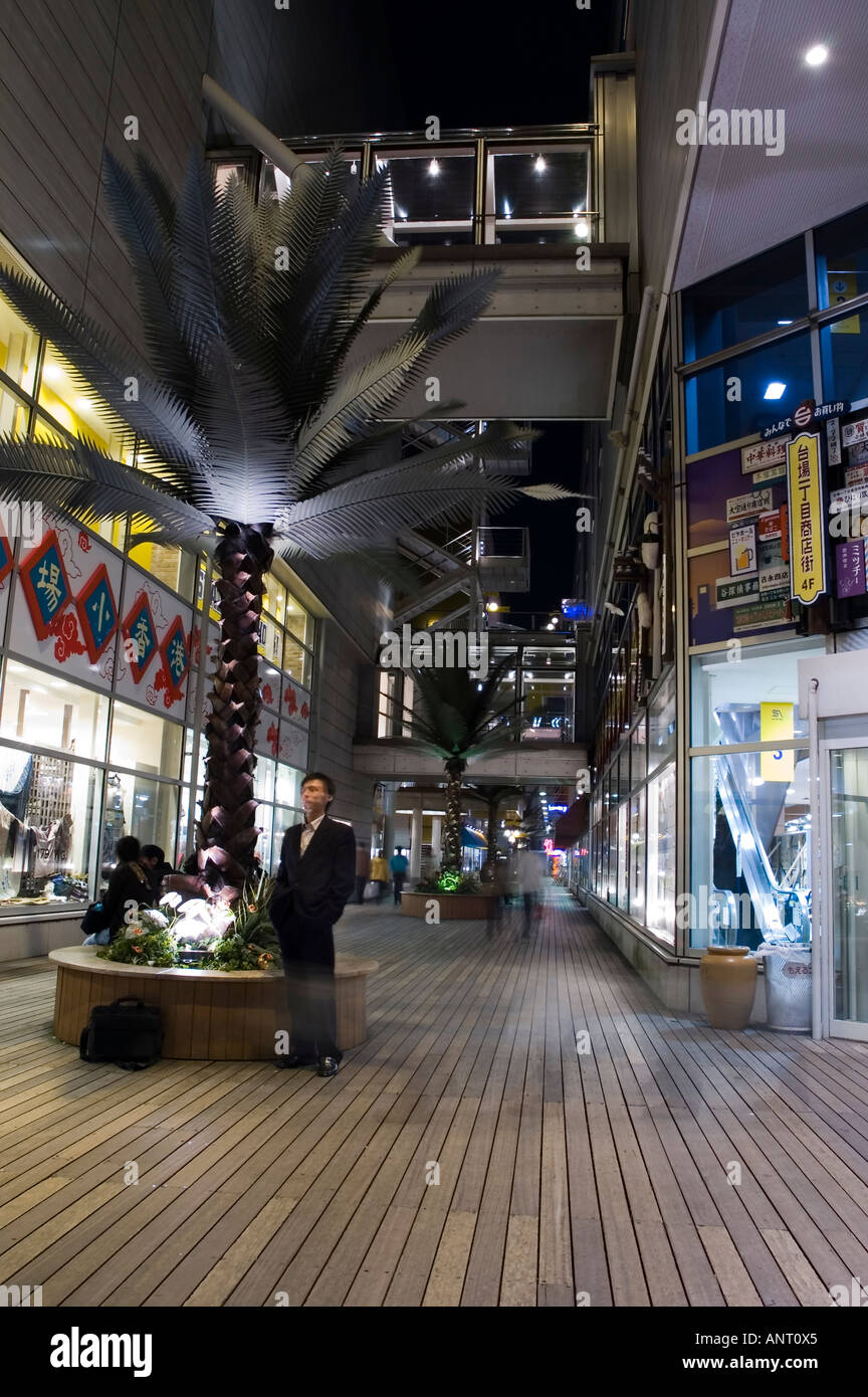 Stock photo of a shopper at the Tokyo Decks Beach shopping mall in ...