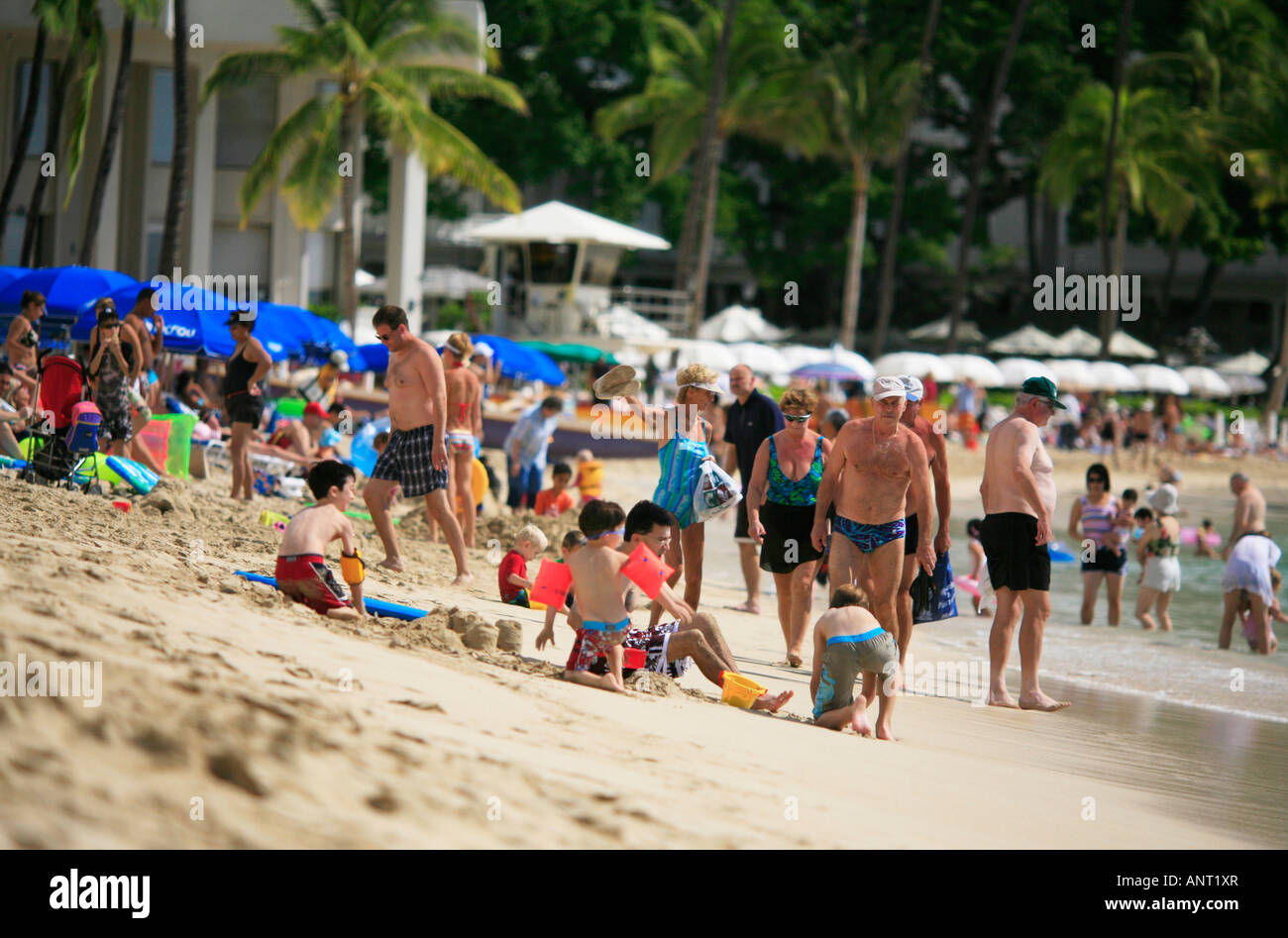 Sunbathers on Waikiki Beach Honolulu Hawaii Stock Photo - Alamy