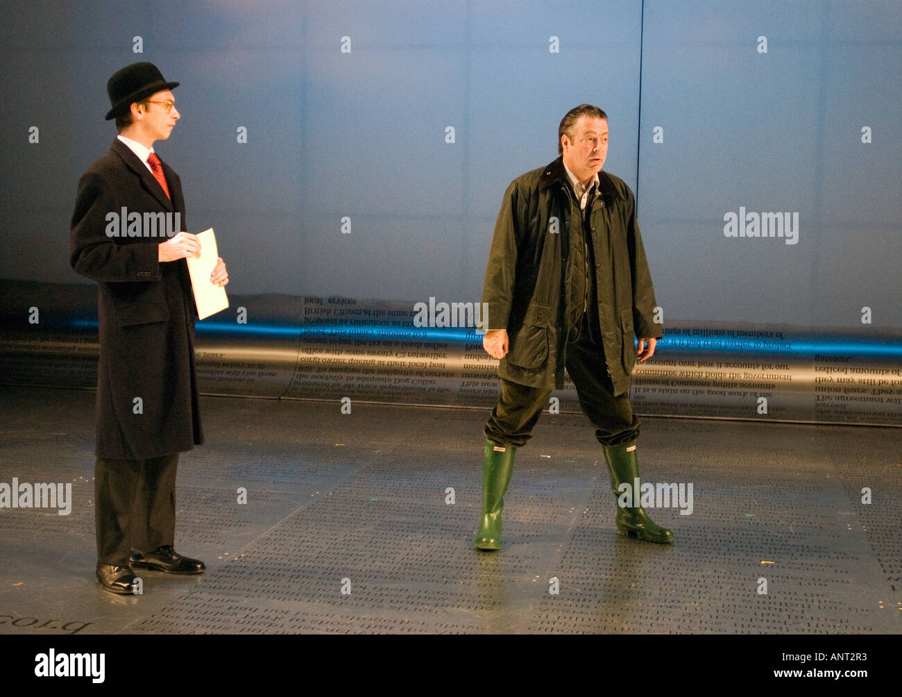Christopher Logan in bowler hat playing a journalist and Roger Allam as ...