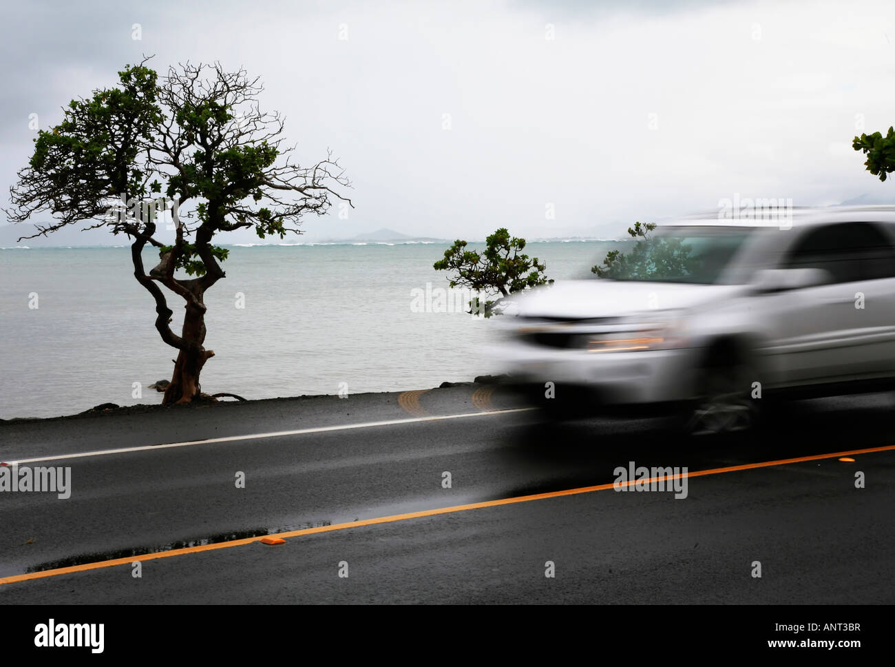 Car driving along coast road on eastern Oahu Stock Photo - Alamy