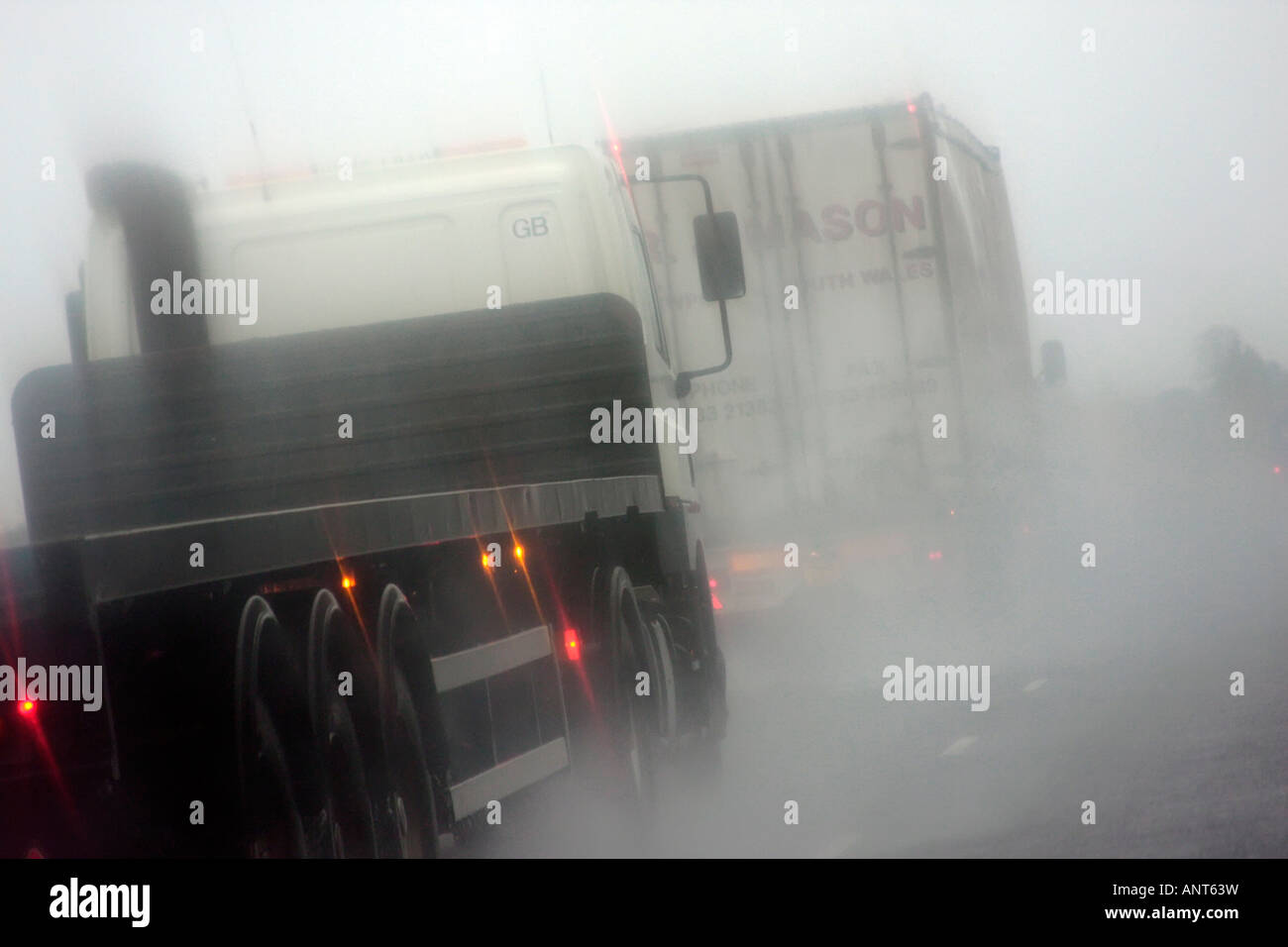 lorries on a rain-soaked motorway in england UK Stock Photo - Alamy