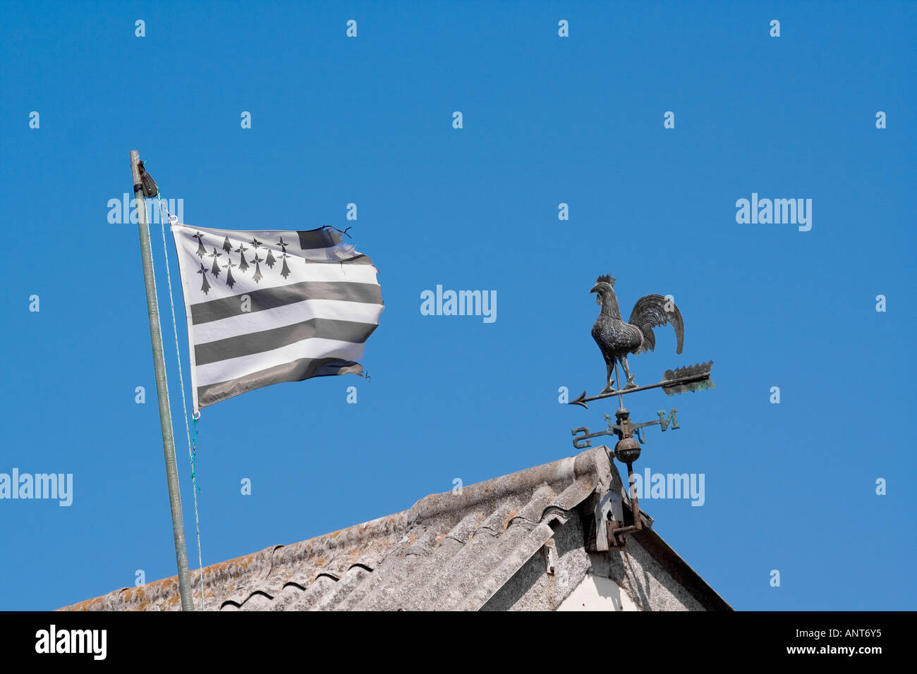 wind vane with flag Stock Photo - Alamy