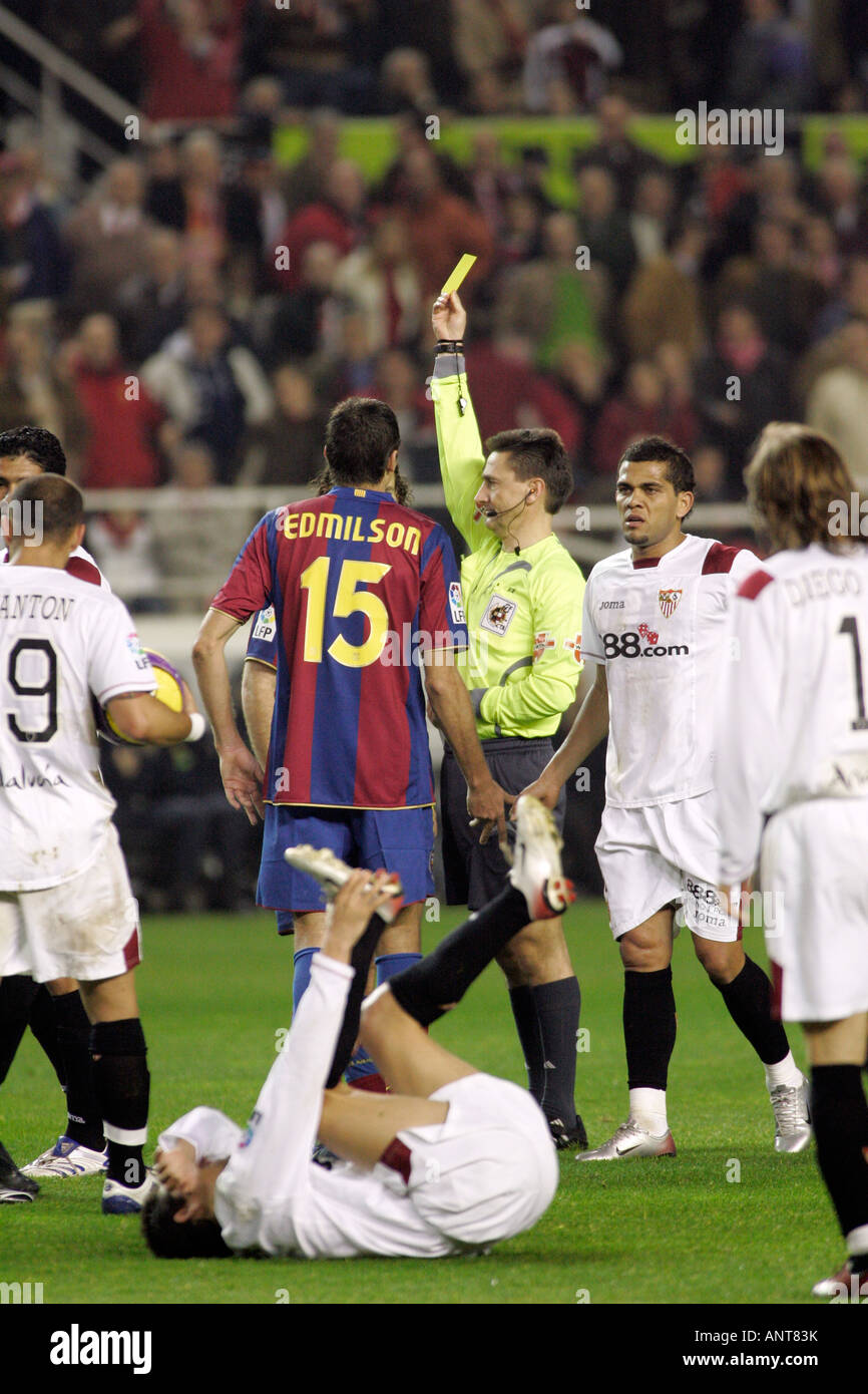 The referee booking a FC Barcelona player Stock Photo - Alamy