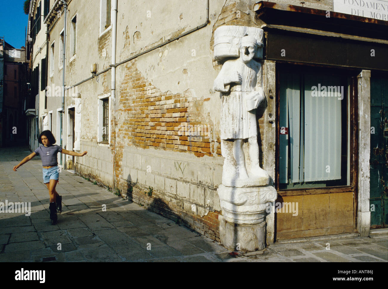 Italy Venice One of the statues known as Mori on the Campo dei Mori ...