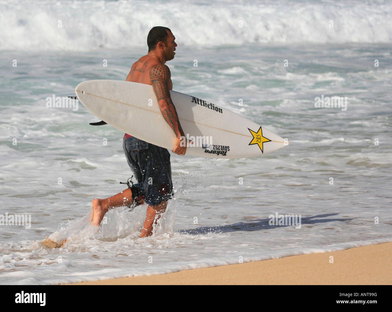 Surfer on Sunset Beach North Shore Oahu Hawaii Stock Photo - Alamy