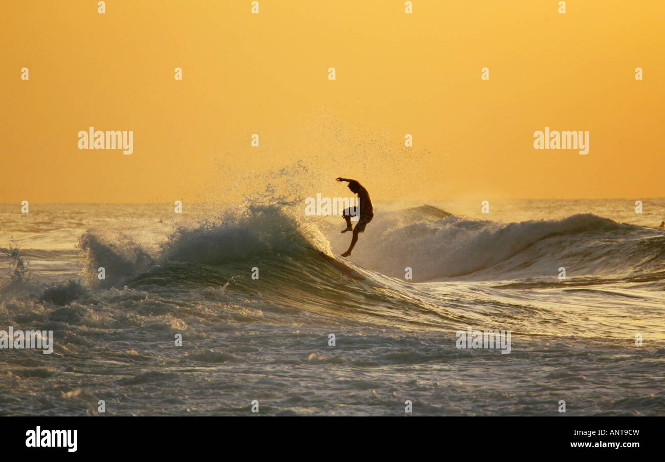 Surfer falling off board on Sunset Beach North Shore Oahu Hawaii Stock ...