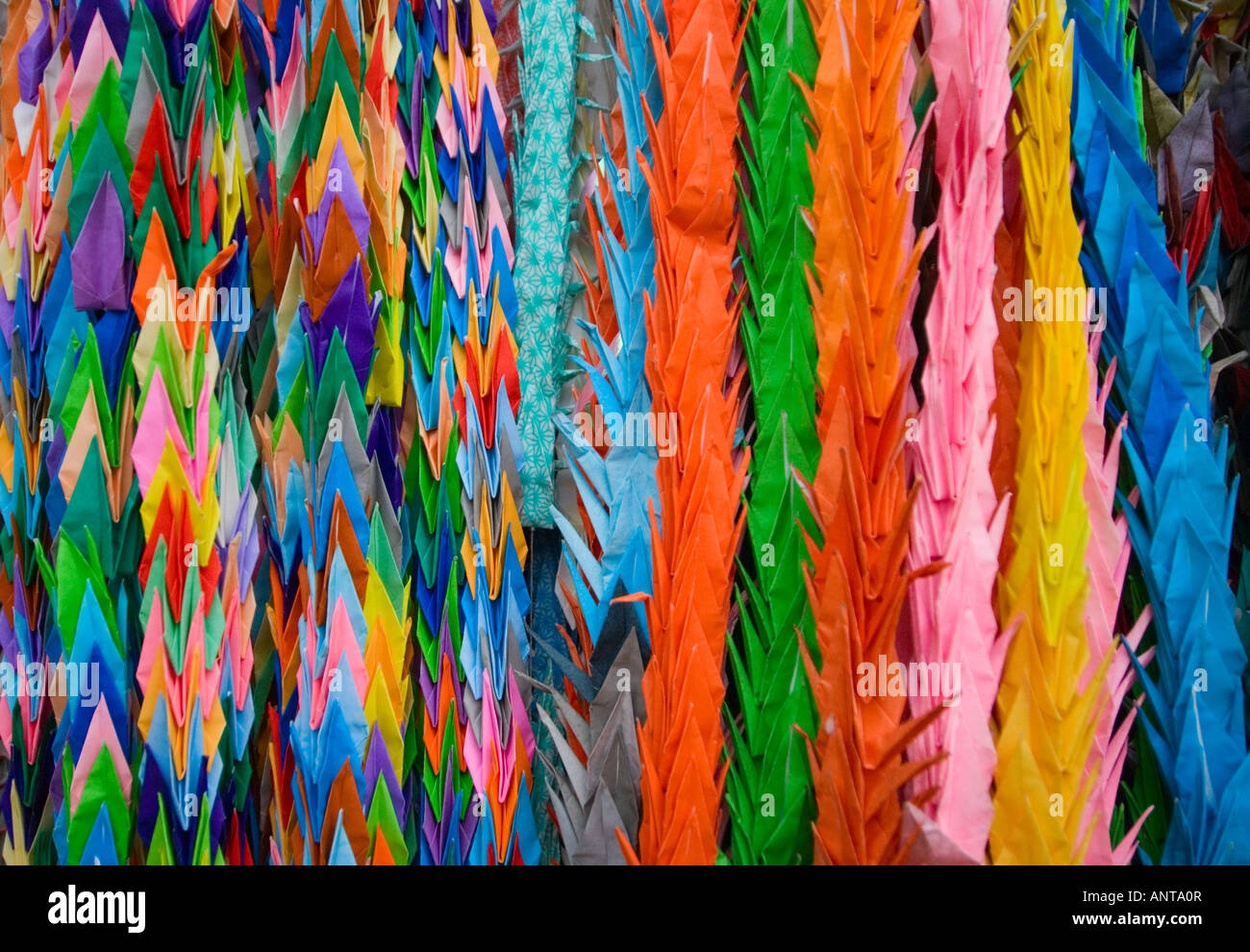 Strings of paper birds ^origami ^cranes Japan Stock Photo - Alamy