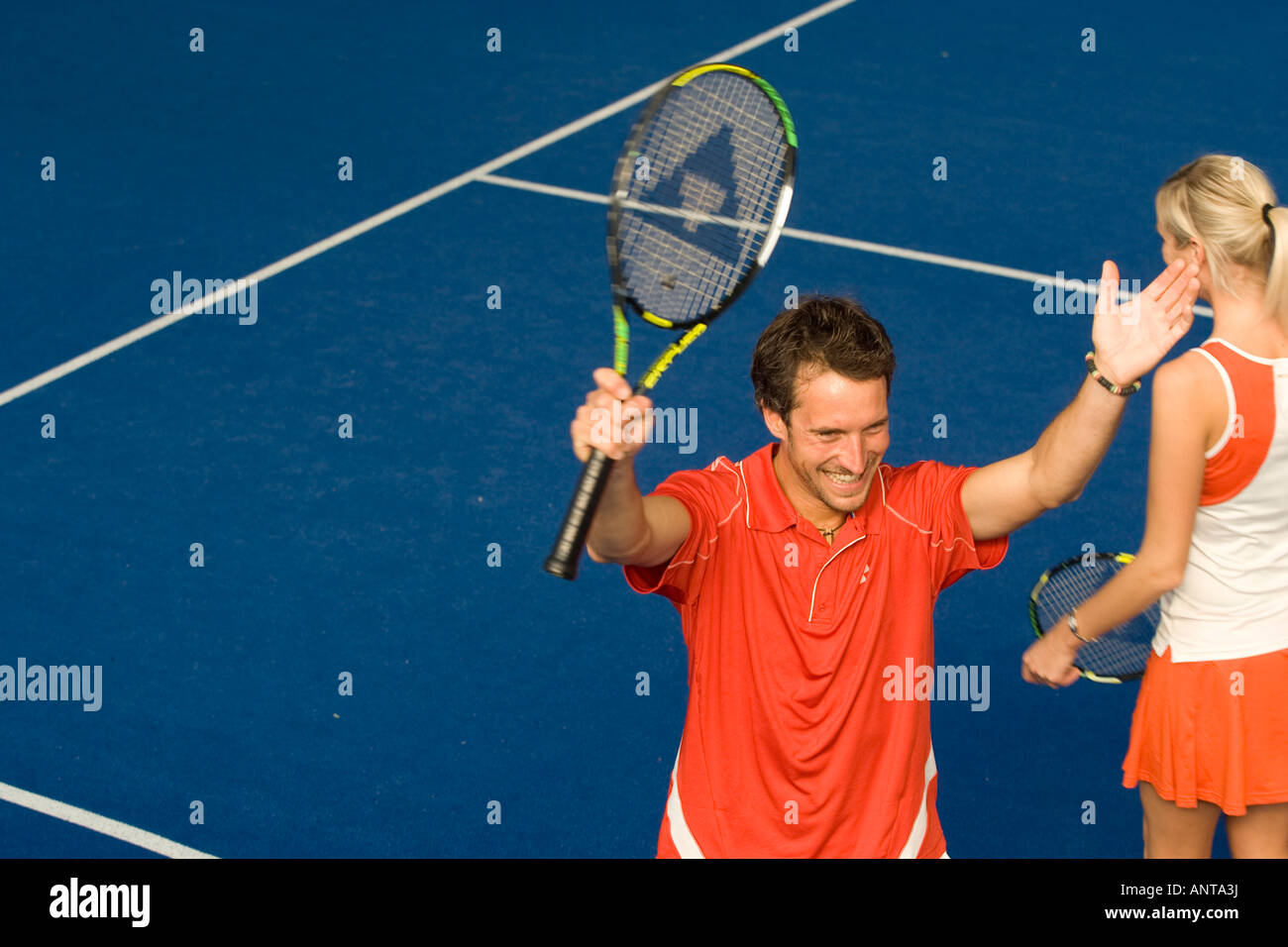 Man woman fun tennis hi-res stock photography and images - Alamy