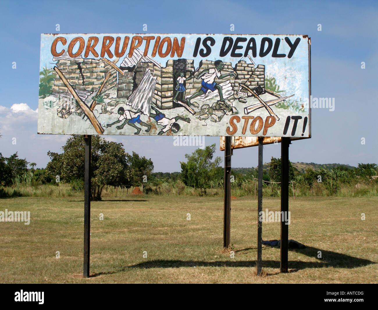 Signboard warning against the dangers of corruption on Masaka Road ...