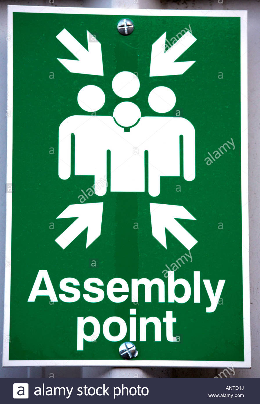 Assembly point signpost Stock Photo - Alamy