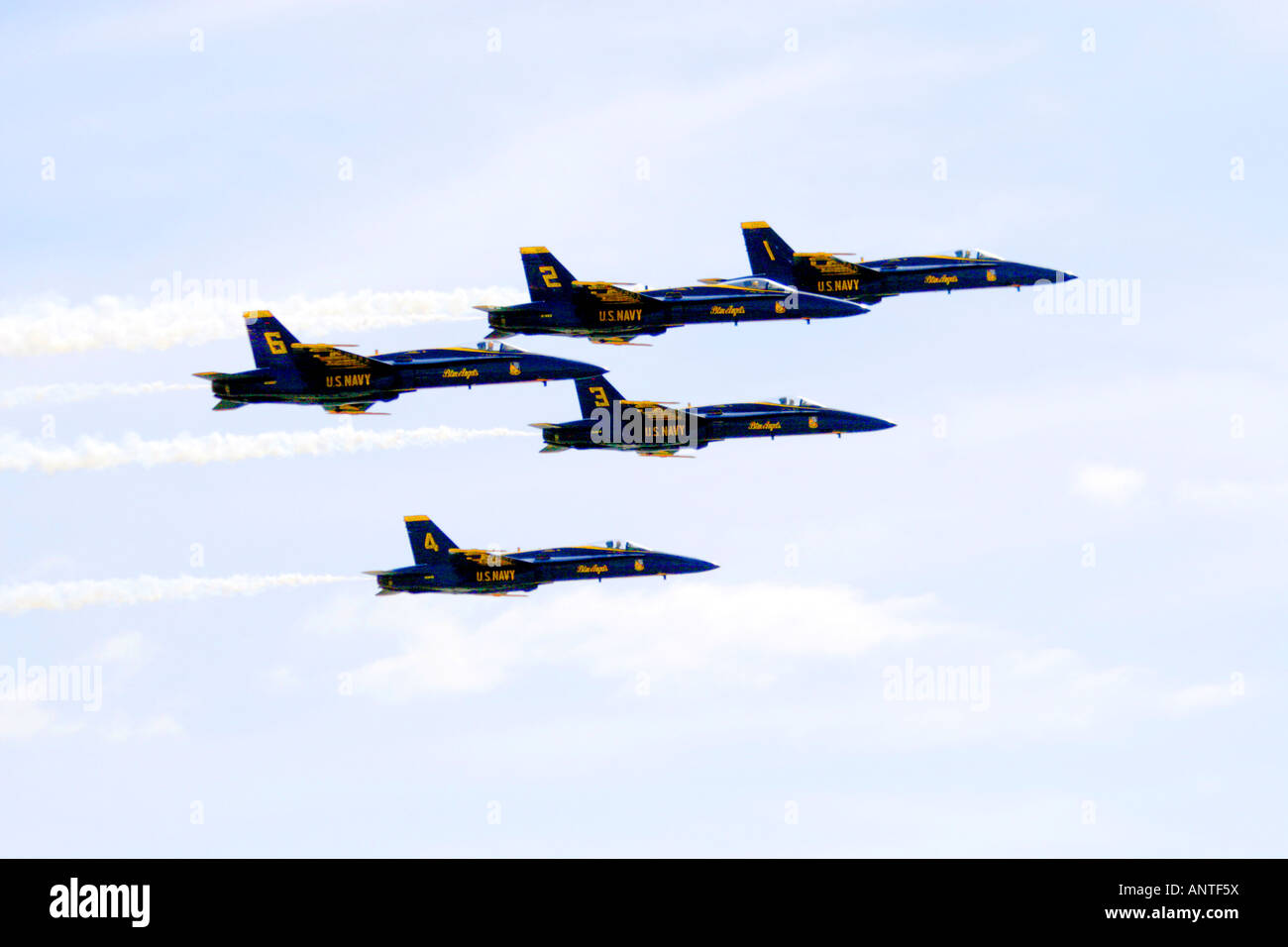 The Blue Angels F/A-18 Hornets fly in tight formation, maintaining 18 ...