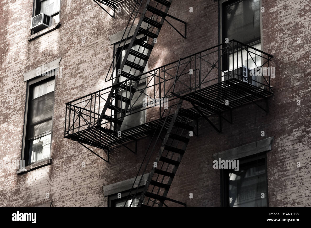 Fire escape on the side of a New York block Stock Photo - Alamy