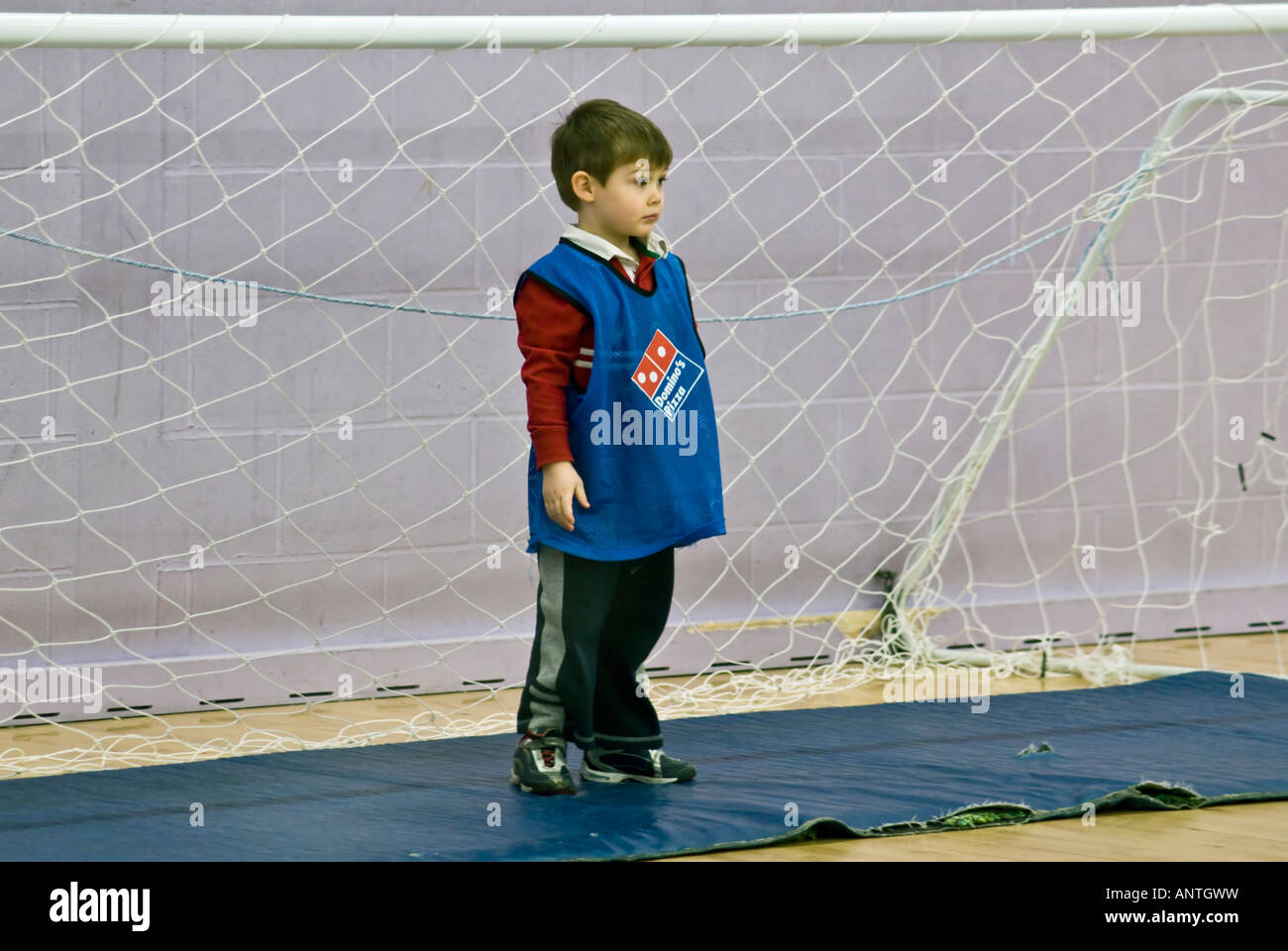 Football junior full length hi-res stock photography and images - Alamy