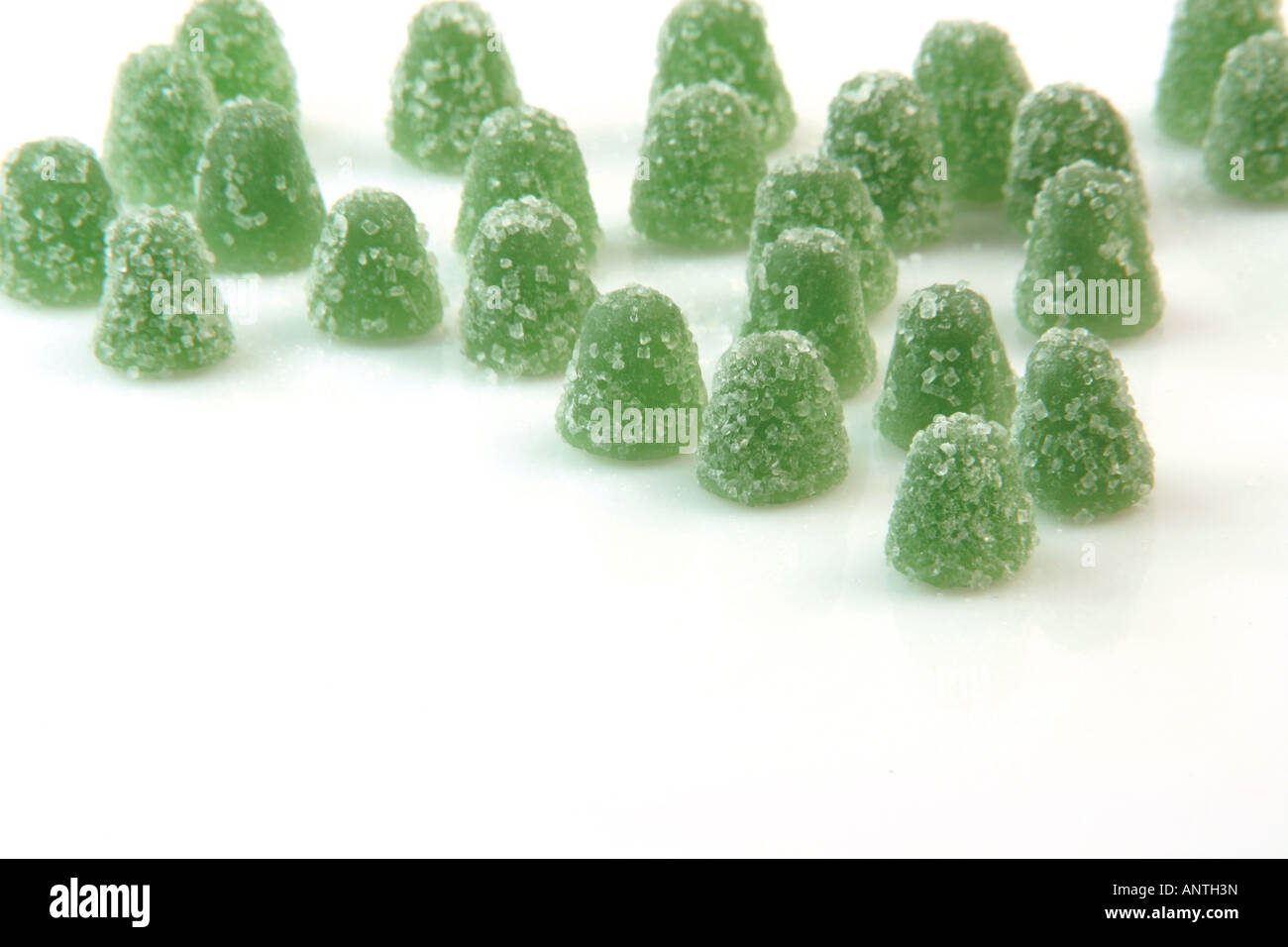 green sugar jelly mints isolated on white background sweets and candy ...