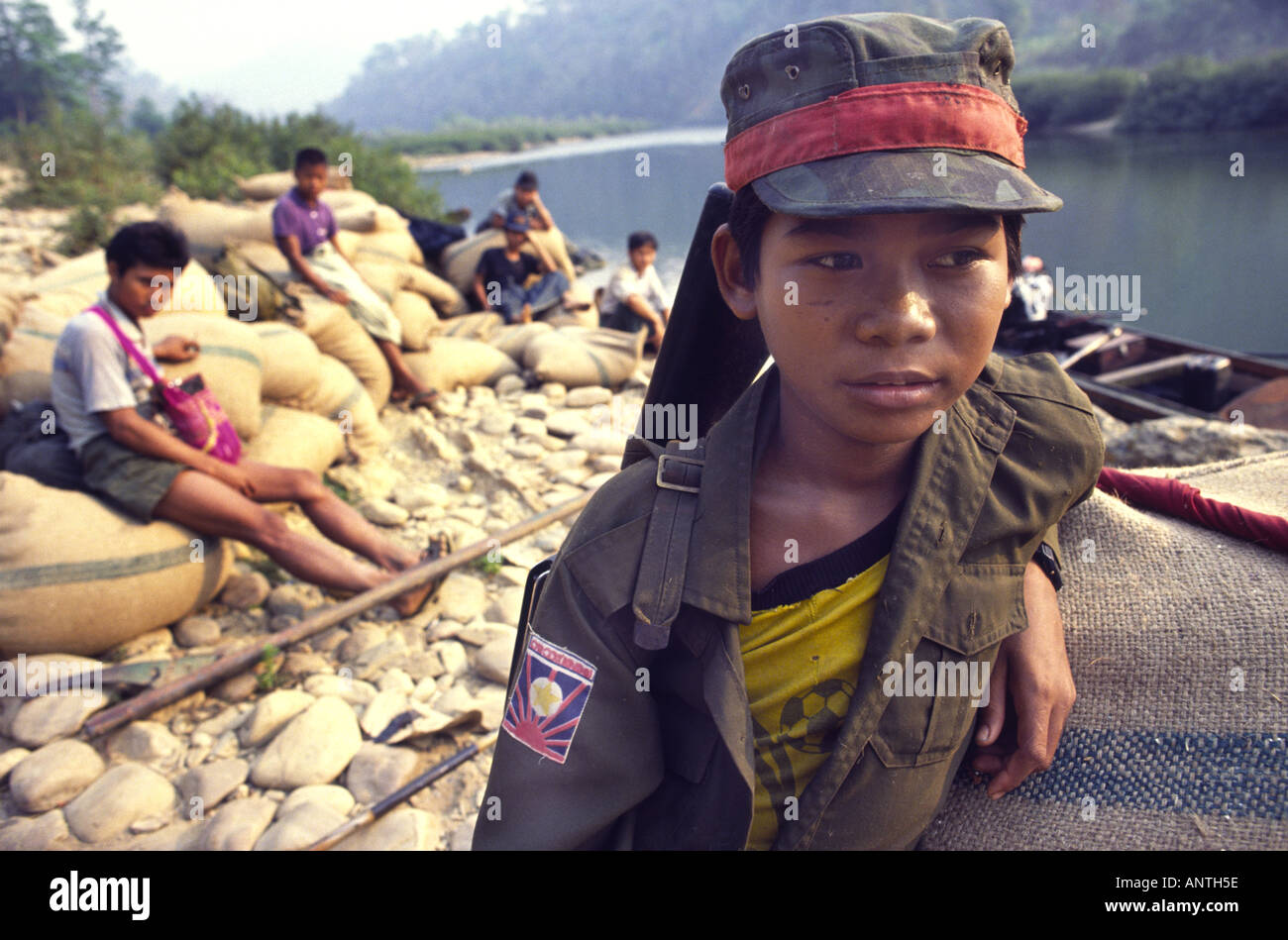 KNLA boy soldier guarding a river crossing Kawtholei Burma Stock Photo ...
